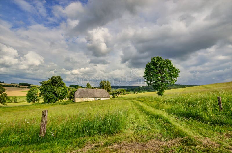 Cottage in a remote area stock image. Image of grass - 41582209