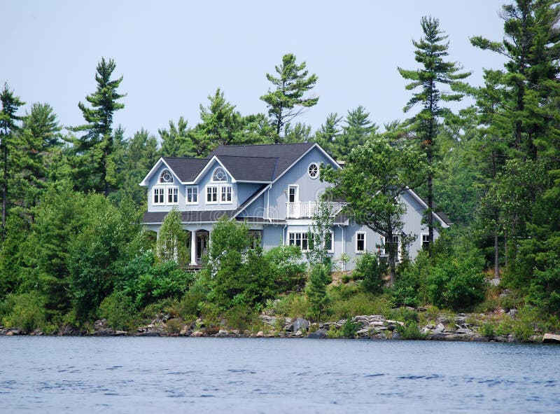 Cottage on rocks stock photo. Image of rocky, building - 10483936