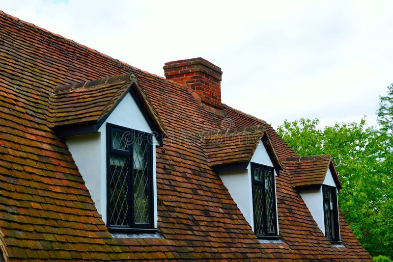 Cottage roof with tiles stock image. Image of country - 41639657