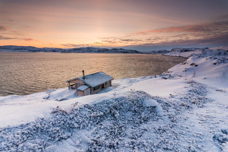 Cottage on the Shore of the Arctic Ocean at Sunset in Winter Stock ...