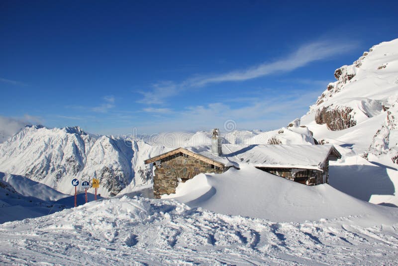Cottage on the snowy crest stock photo. Image of lanscape - 29004032