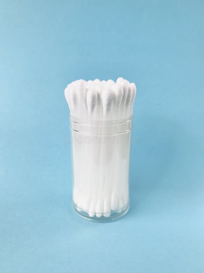 Cotton Buds in a Container on a Blue Background. Stock Image - Image of ...