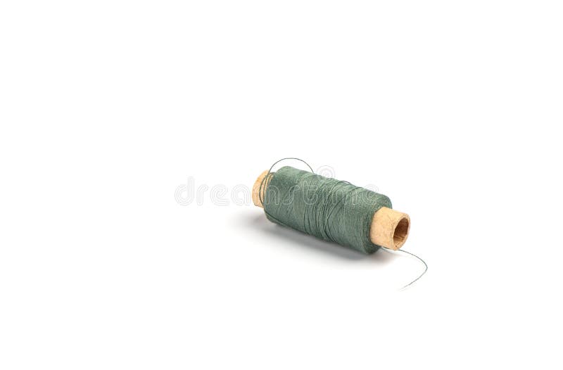 Cotton Dark Green Threads on the Cardboard Sleeve for the Sewing ...