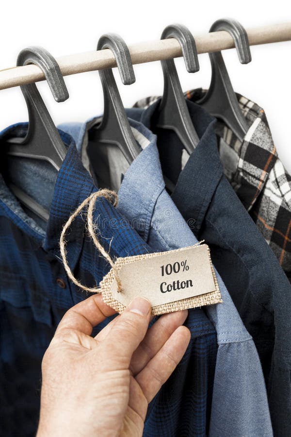 100 Cotton Shirt Clothing with Label on a Hanger Stock Photo - Image of ...