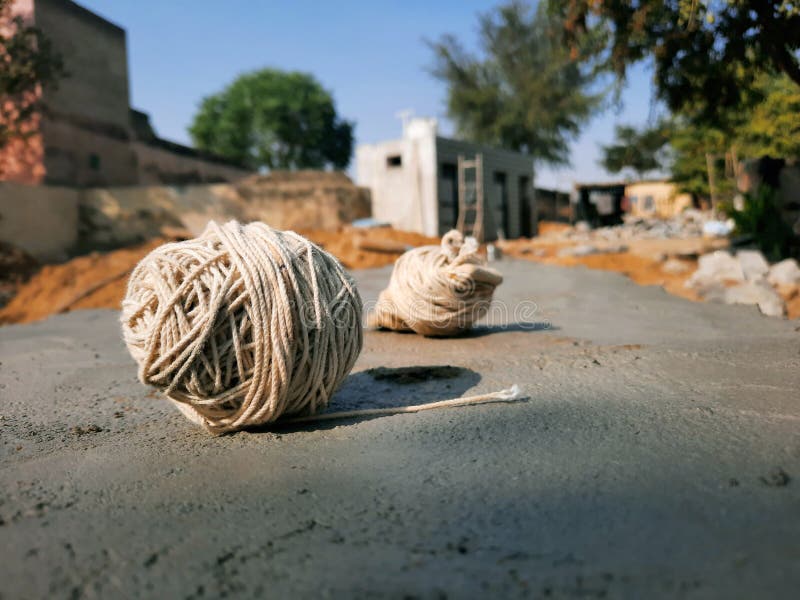Cotton Thread Roll on Wall on a Construction Site Stock Image - Image ...