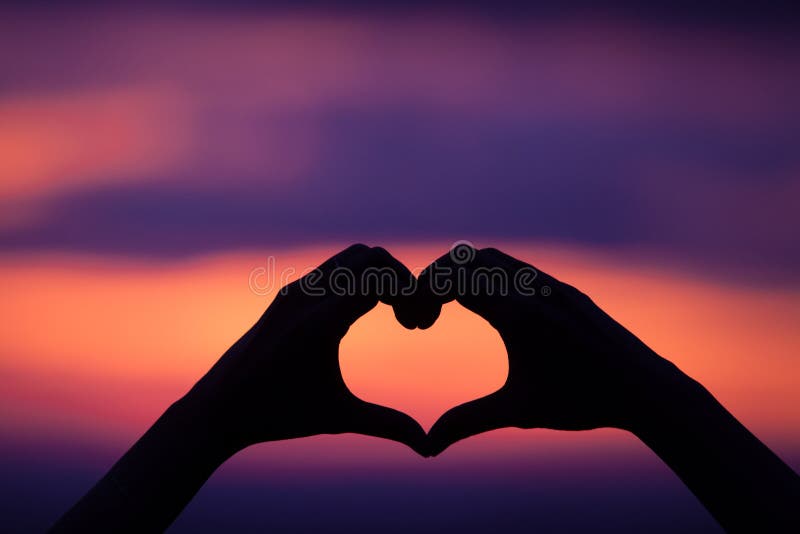 Coucher Du Soleil D'amour De Forme De Coeur De Main Photo stock - Image ...
