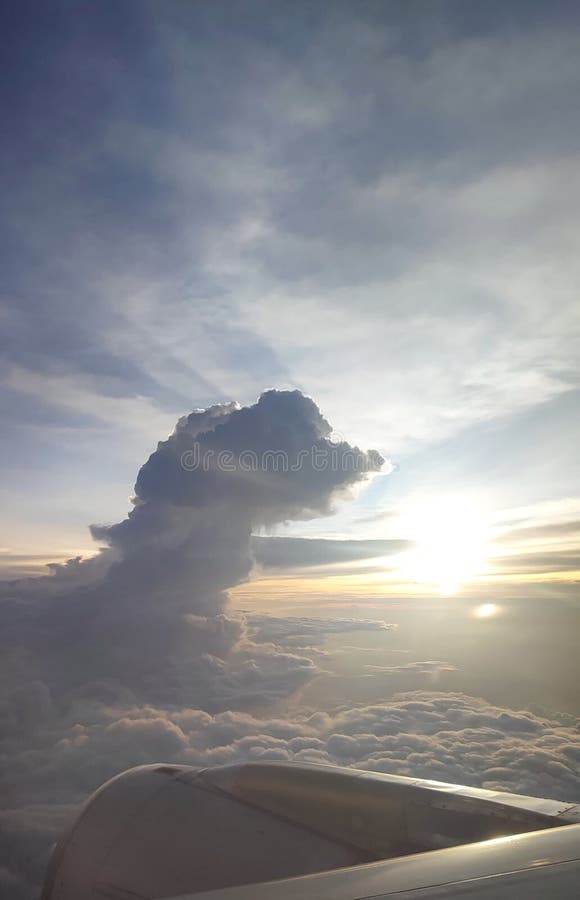 Coudy Sunset View from Airplane Window Stock Photo - Image of sunset ...
