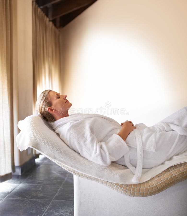 She Could Fall Asleep In This Chair A Woman In A Day Spa Relaxing On A