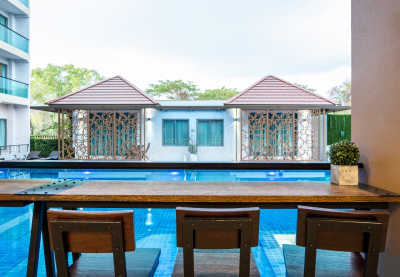 Counter Bar in Loft Style beside Swimming Pool Stock Photo - Image of ...