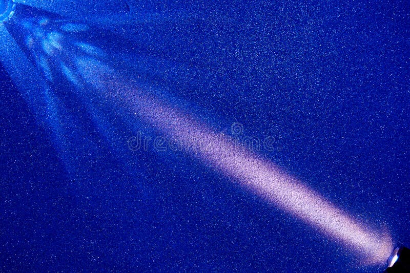 Counter Diagonal Diffused Blue and Direct Pink Rays of Light on a Dark ...