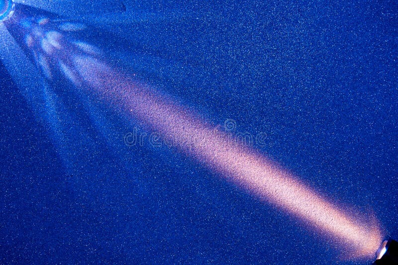 Counter Diagonal Diffused Blue and Direct Pink Rays of Light on a Dark ...