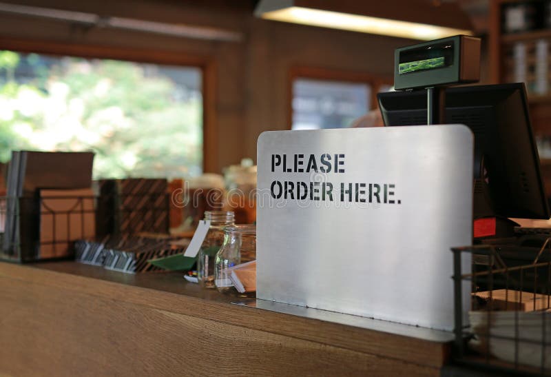 Counter with Monitor at Restaurant - Please Order Here Stock Image ...