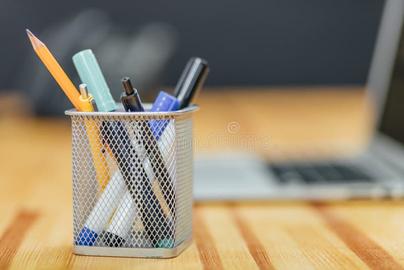 Counters, Pens with Different Colored Stickers on a Wooden Table ... Counters, Pens with Different Colored Stickers on a Wooden Table ...