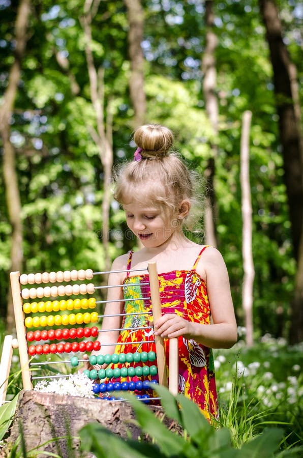 Counting in the abacus stock image. Image of beautiful - 93060157