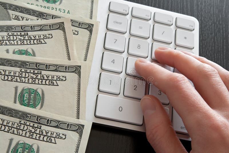 Counting Money on Computer Calculator Stock Photo - Image of electronic ...