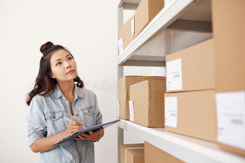 Counting packages stock image. Image of shelf, warehouse - 127950679