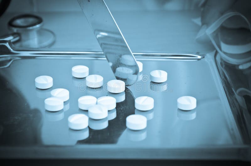 Counting tablets medicine stock image. Image of drugs - 43859247