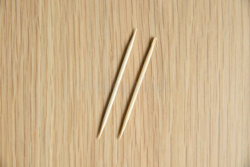 Two Toothpick on Wooden Table Stock Image - Image of fourth ...
