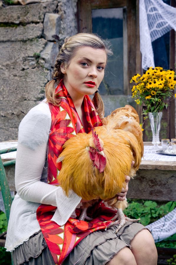 329 Woman Holding Rooster Stock Photos - Free & Royalty-Free Stock ...