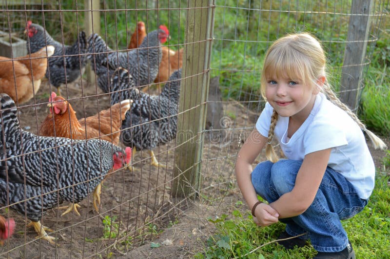 Girl hugging a chicken stock photo. Image of garden, chicken - 18926274