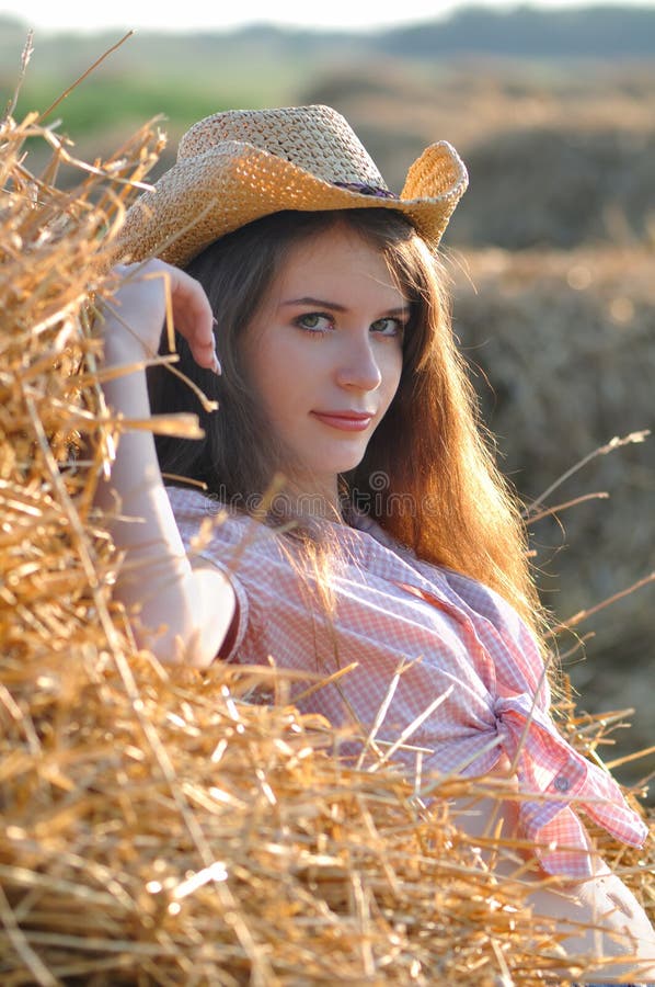 Country girl on hay stock image. Image of cheerful, agriculture - 26534061