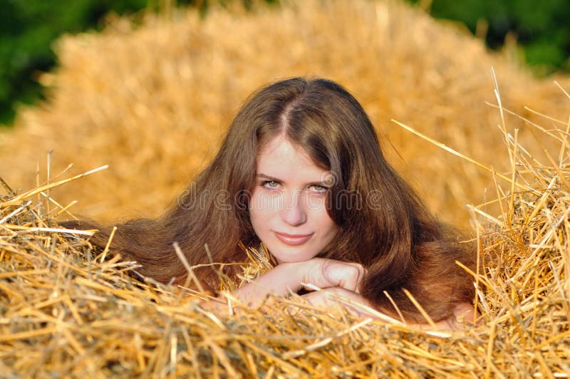 Country girl on hay stock photo. Image of gorgeous, attractive - 26929104