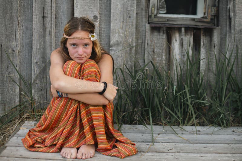 Country Girl Sits on the Ground with a Guilty Look Stock Image - Image ...