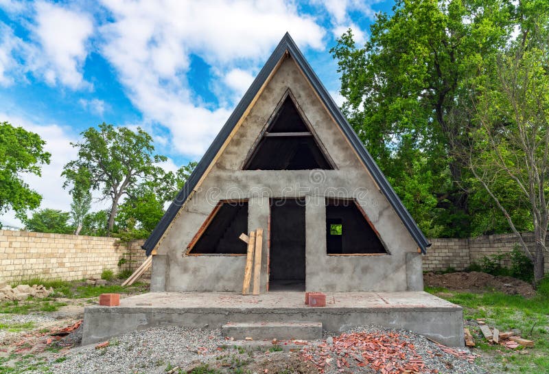 A Country House with a Brick Wall and Roof is Being Built Stock Photo ...