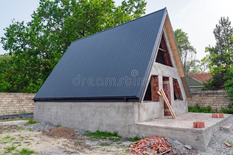 A Country House with a Brick Wall and Roof is Being Built Stock Photo ...