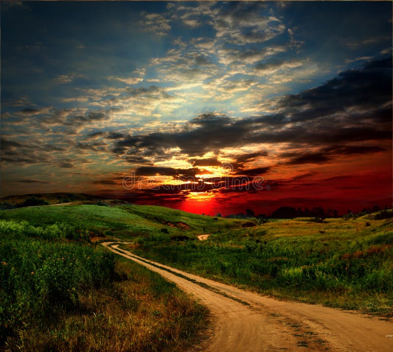 Field and Dirt Road To Sunset Stock Photo - Image of evening, dirt ...