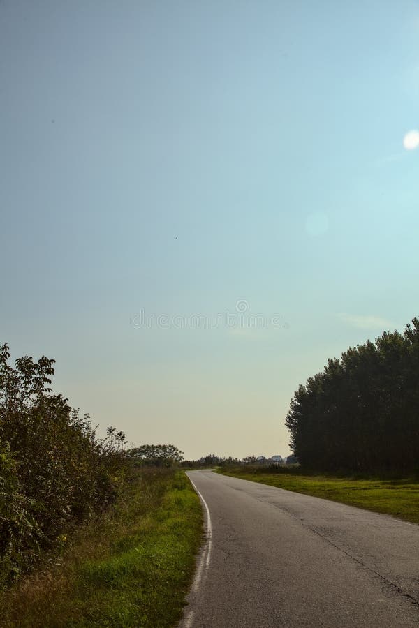 Country Road in Autumn at Noon on a Clear Day Stock Image - Image of ...