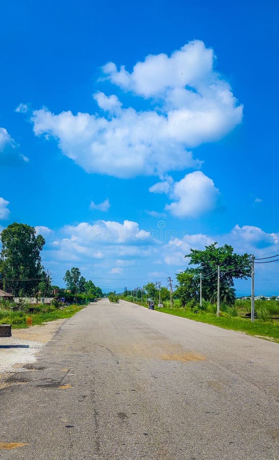 Country Road Blue Sky No Man Zone Stock Photo - Image of horizon, tree ...