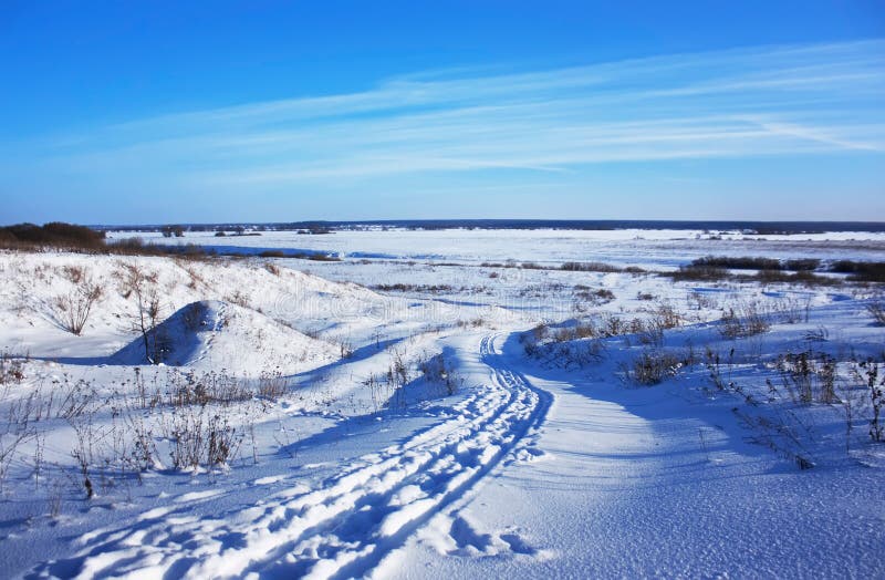 Country Road Covered with Snow in the Winter Field Stock Image - Image ...