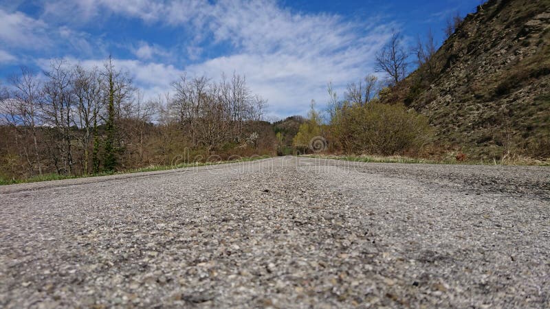 Country Road from Ground Level Stock Photo - Image of ground, road ...