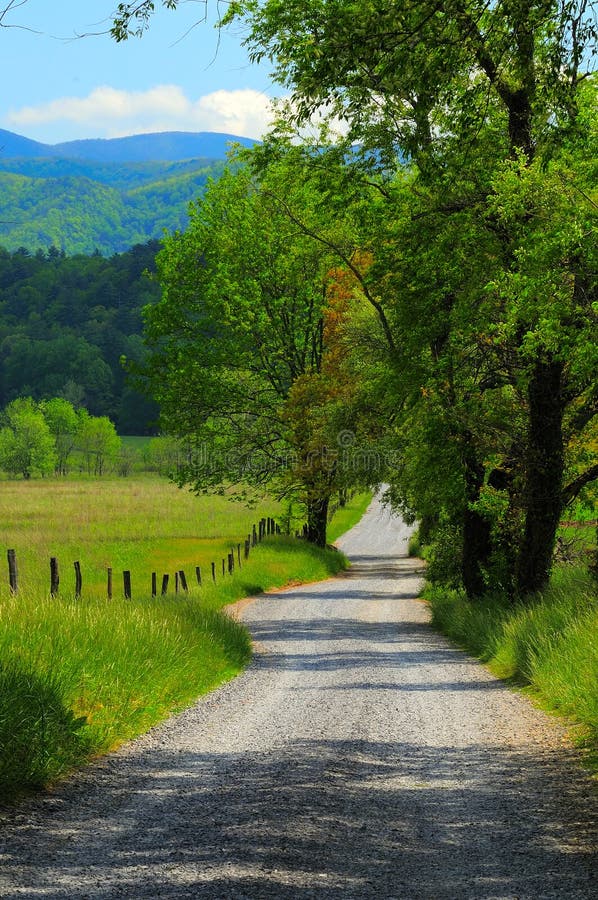 Country road portrait stock photo. Image of cove, clouds - 5820952