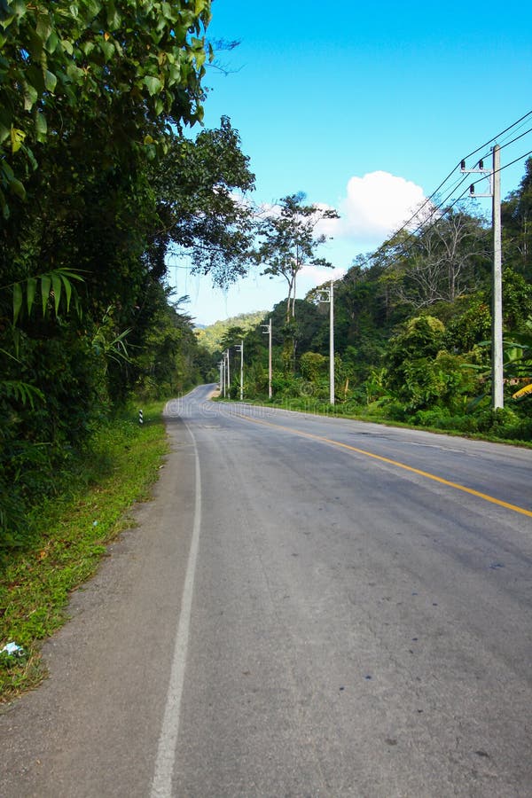 A Country Road Running through Green Fields.winding Road. Stock Photo ...