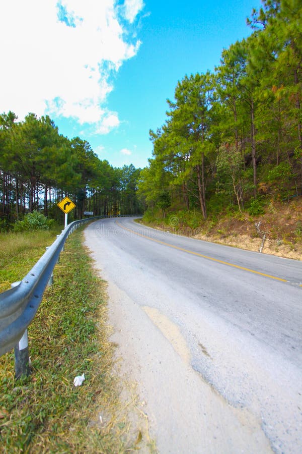 A Country Road Running through Green Fields.winding Road. Stock Image ...
