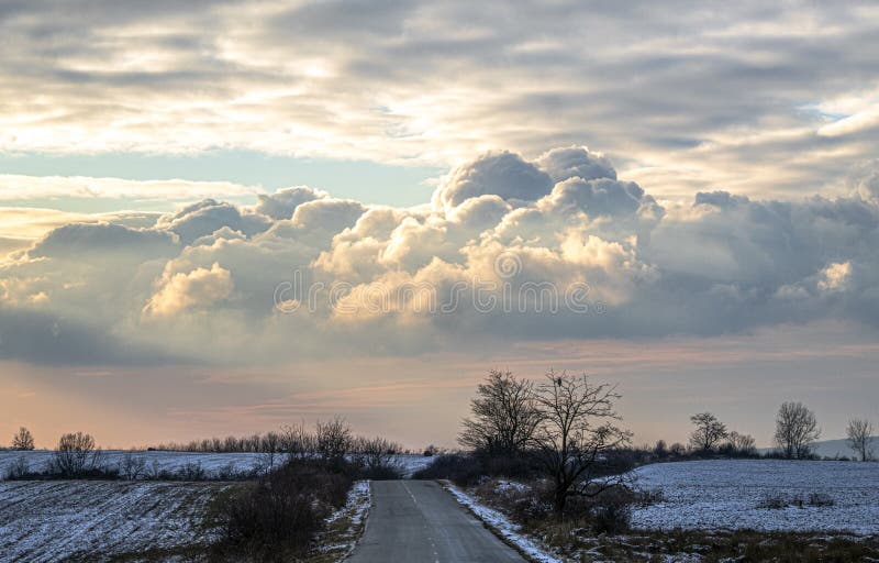 A Country Road with Spectacular Clouds Above , Landscape Stock Image ...