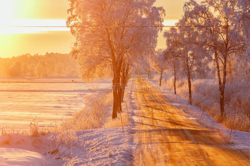Country Road in Sunset Light in a Winter Landscape Stock Photo - Image ...
