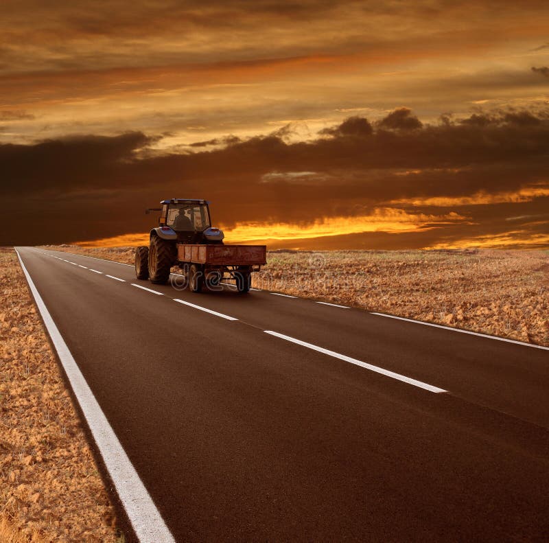 Country road with tractor stock photo. Image of tractor - 98994002