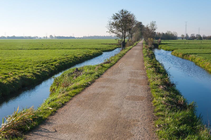 Country Road Between Two Ditches Royalty Free Stock Image - Image: 27710946