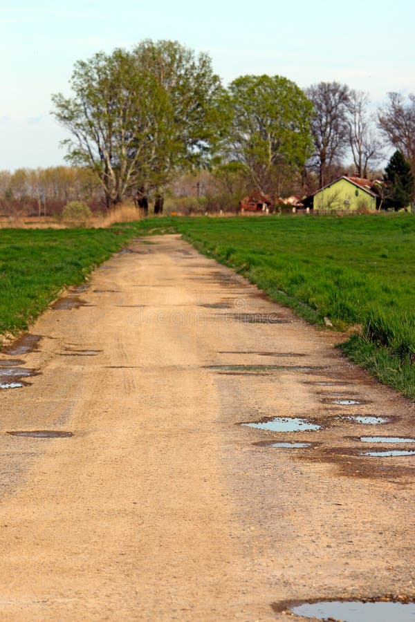 Country road with water stock photo. Image of water, hole - 69334260