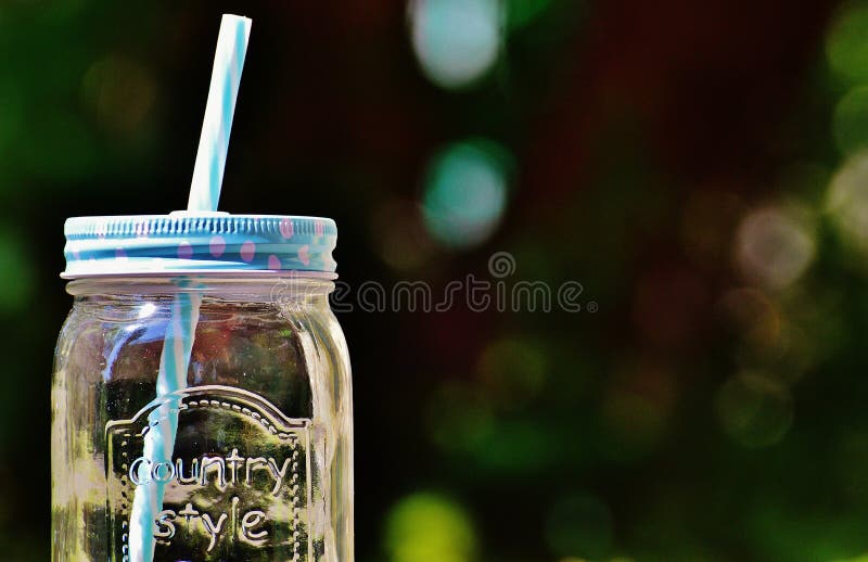 Country Style Glass Mason Jar Stock Photo - Image of macro, straw: 83078588
