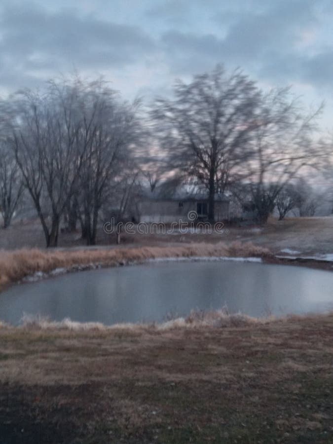 A country winter sunset stock image. Image of winter - 209942285