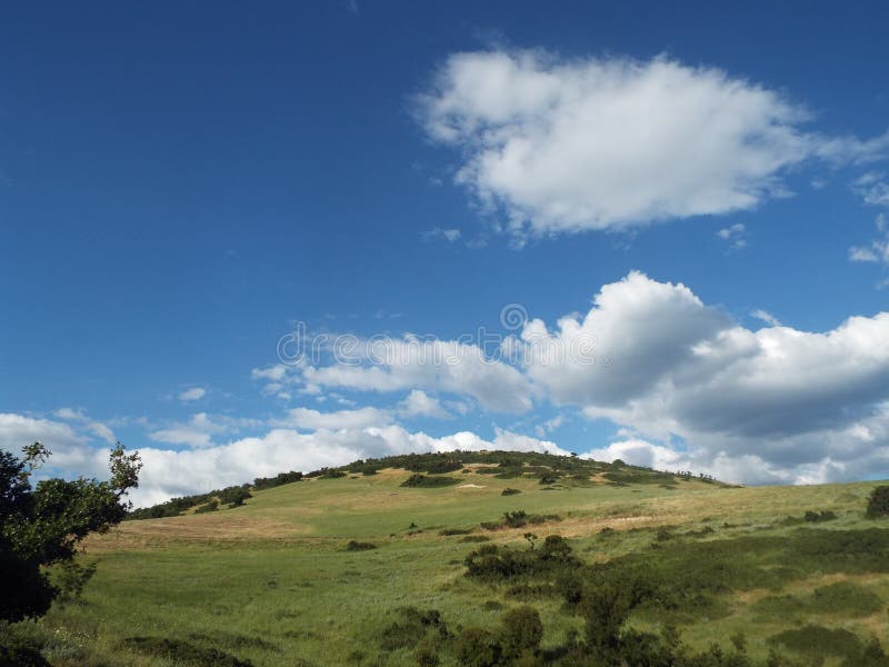 Countryside and cloudy sky stock photo. Image of countryside - 54559576
