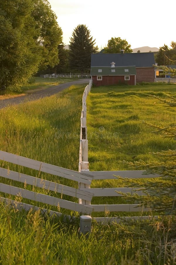 Countryside Fence Leading To a Ranch Stock Image - Image of colours ...