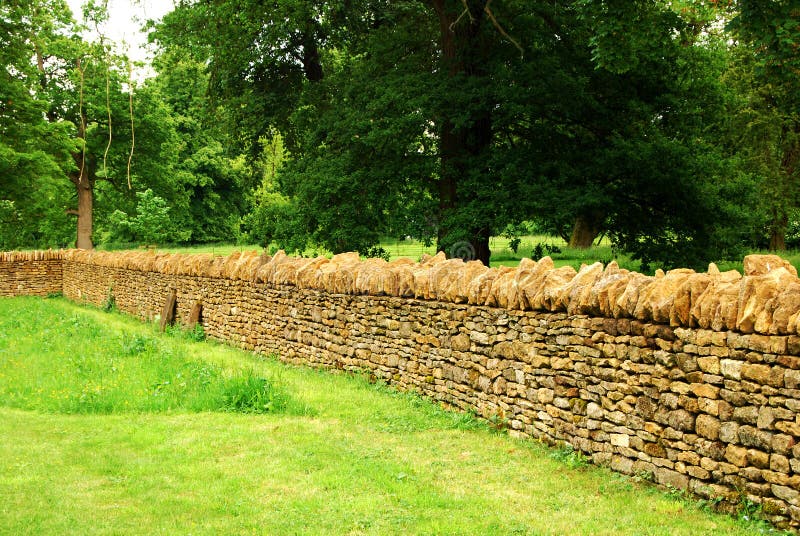 Countryside Garden, Stone Wall Stock Photo - Image of masonry, lawn ...