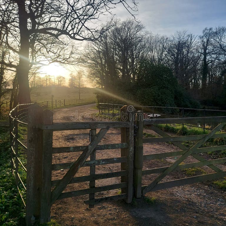 Countryside Gate Under a Scenic Sunset. Stock Photo - Image of wood ...