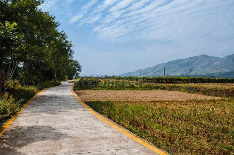 Countryside road scenery stock image. Image of cloud - 82338555