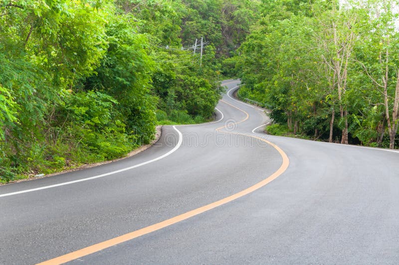 Countryside Road with Trees on Both Sides Stock Photo - Image of hills ...